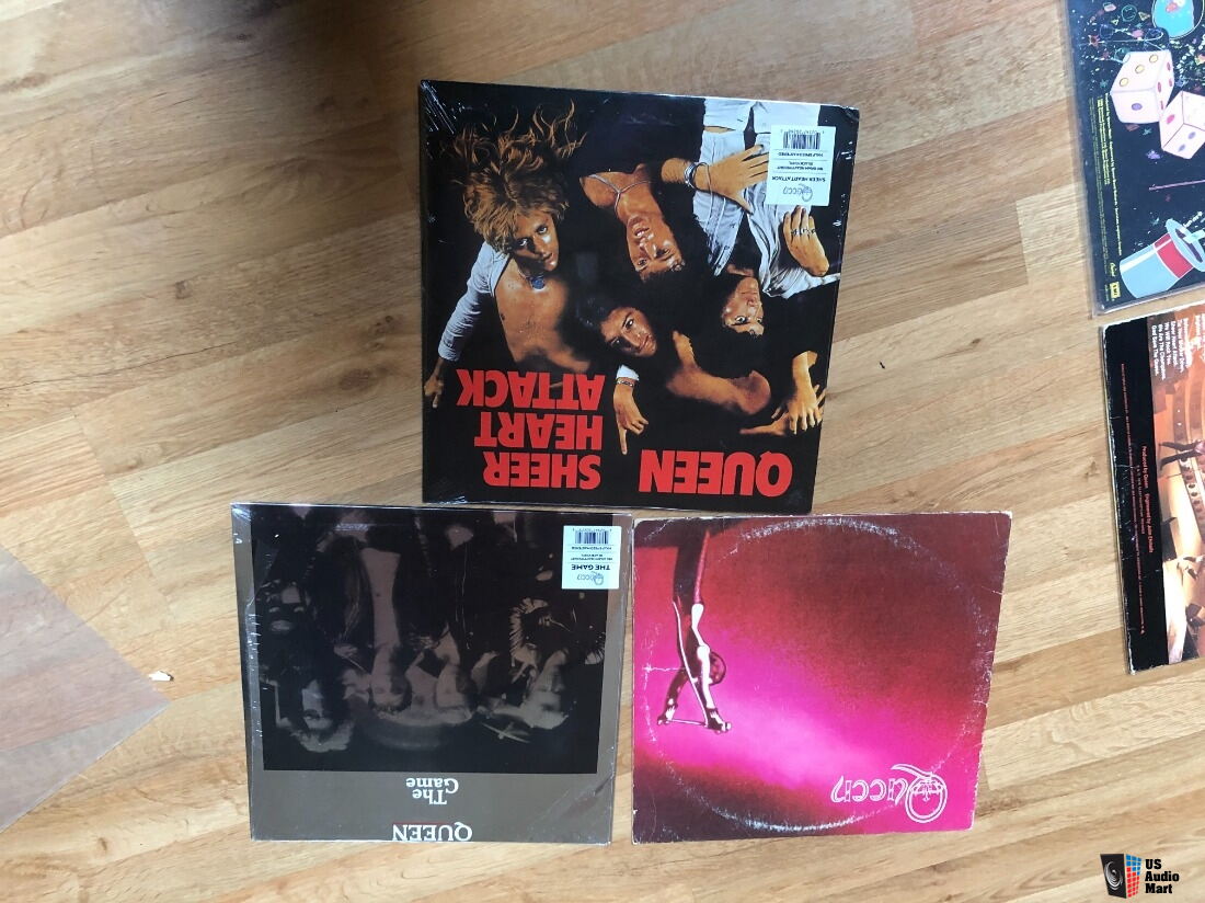Queen 12 LP records a night at the opera, game, News of the world etc ...