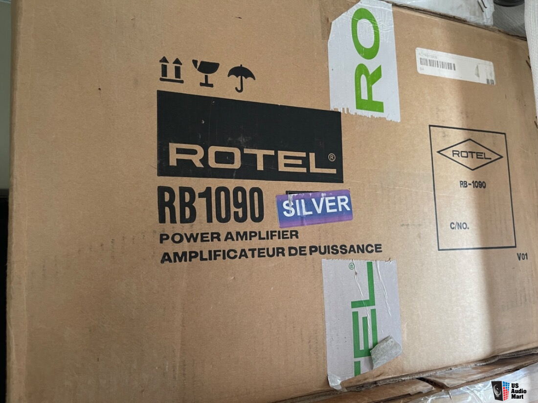 Rotel RB-1090 in silver. New condition with original box 380 watts x 2 ...