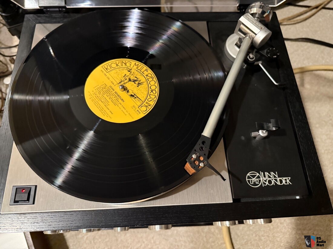 Linn LP12 with an Ittok II tonearm with a Grado Wooden Body Signature ...